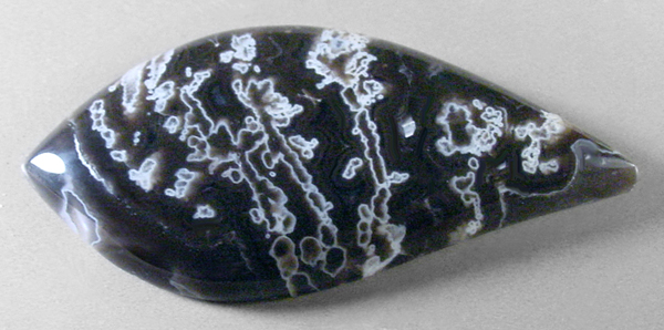 Arco black tube agate cab! Silverhawk's designer gemstones.